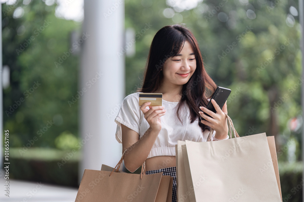 Charming Young Woman Enjoying a Shopping Spree with Paper Bags in a ...