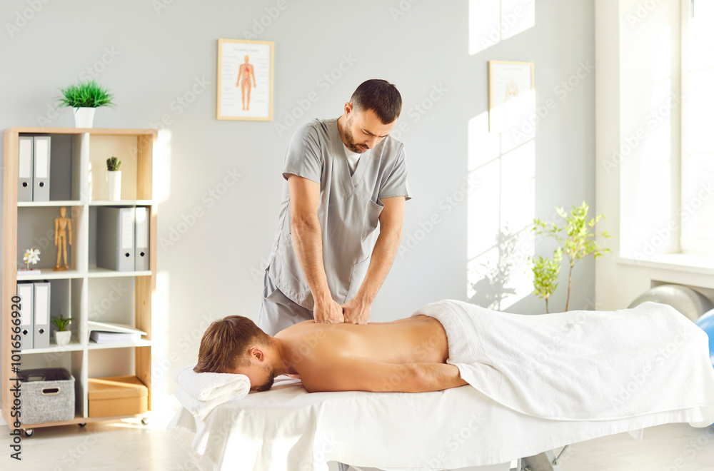Manual therapy session, body relaxing back massage by physical ...