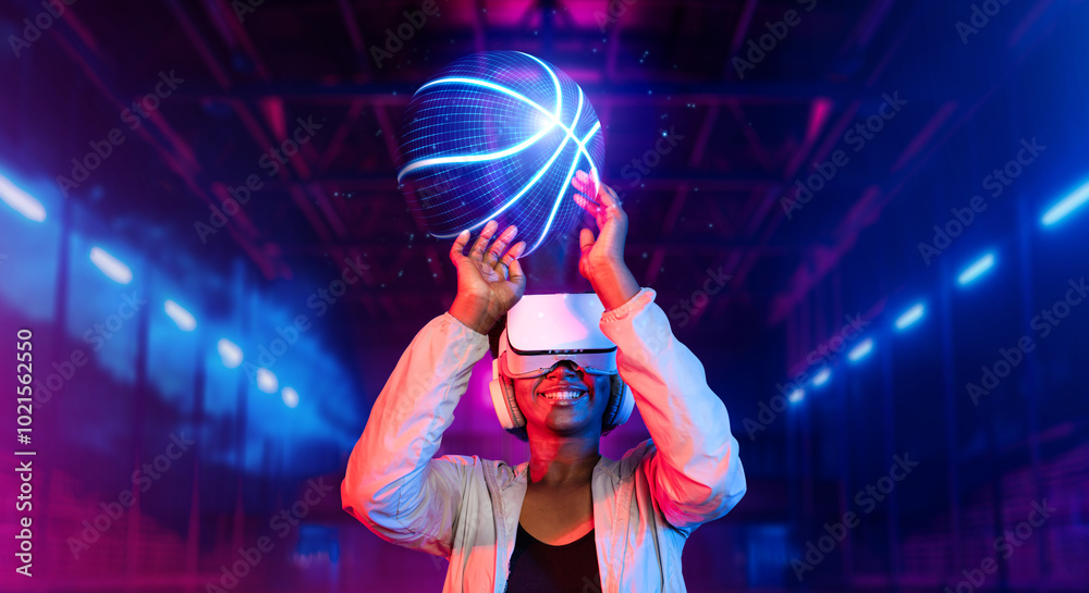 Basketball player holding basketball hologram at futuristic sport arena ...
