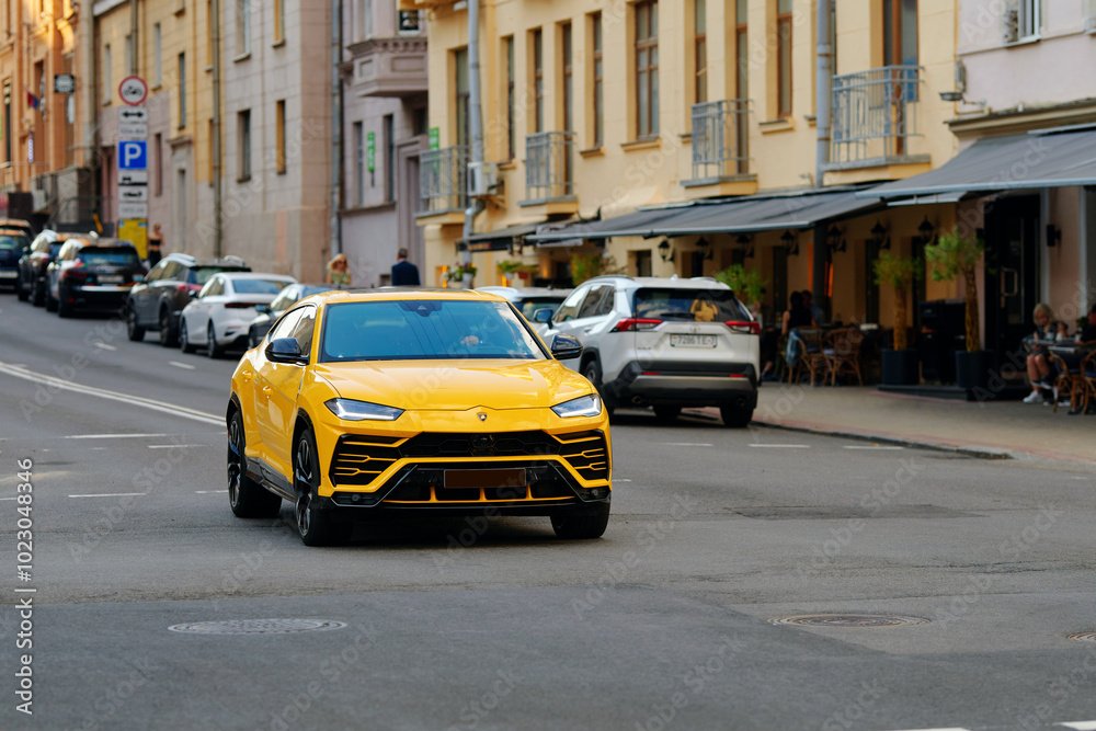 Minsk, Belarus. Aug 30, 2024. Yellow Lamborghini Urus SUV cruising ...