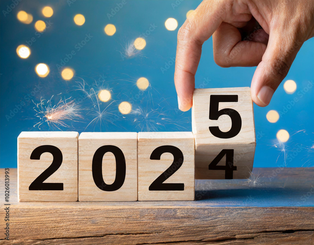 Countdown to New Year with wooden blocks changing from 2024 to 2025 on ...