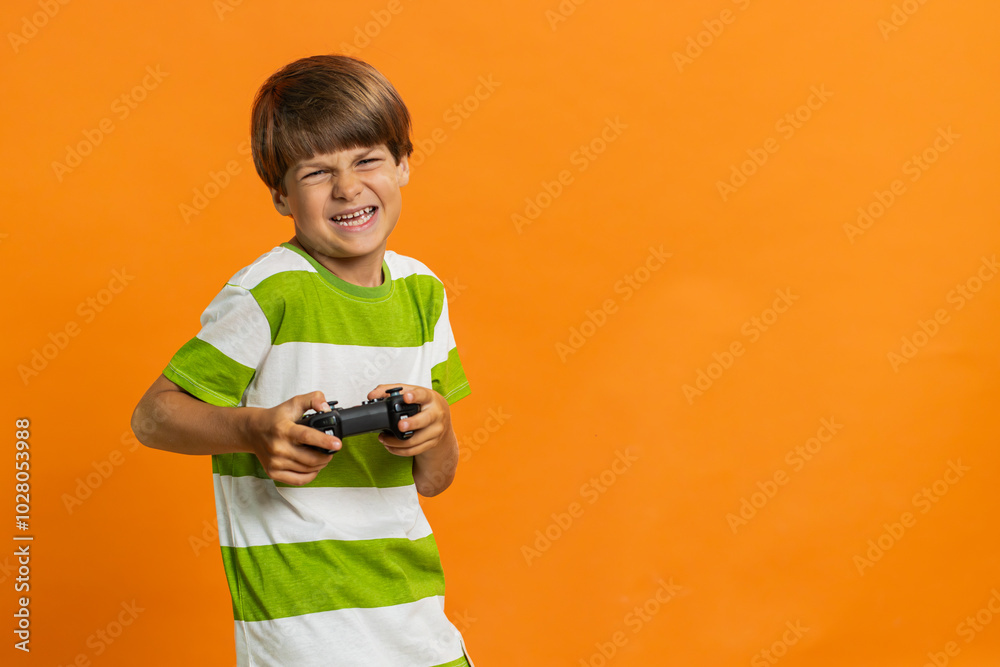 Young preteen child boy kid using joystick controller playing video ...