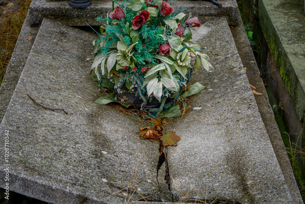 Old forgotten tombstone in the city cemetery. grave without information ...