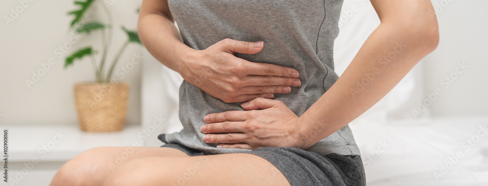 Flatulence ulcer, suffering ache young woman hand holding belly ...