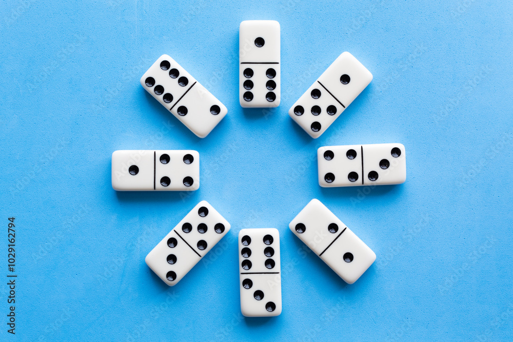 The game of dominoes is a table game involving rectangular pieces with ...