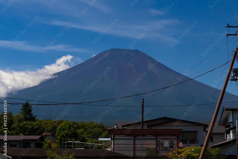 This is a beautiful image of Mount Fuji stretching up into the clear ...