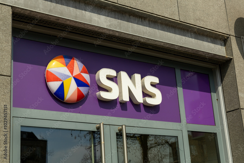 SNS sign logo above the entrance, SNS is part of de Volksbank ...