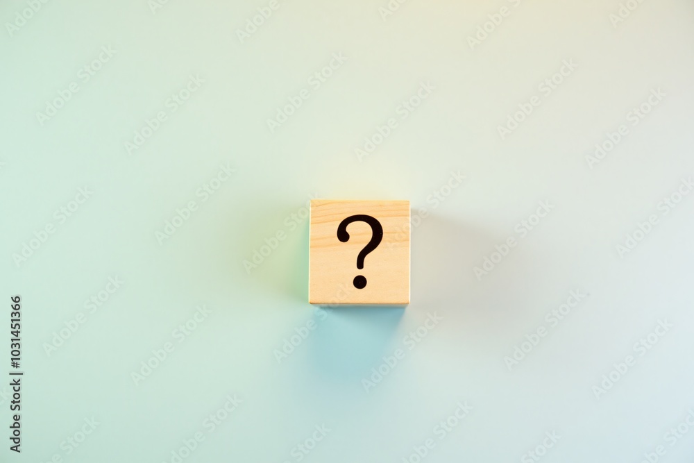 Top view, Wooden cube block with question mark icon, isolated on pastel ...