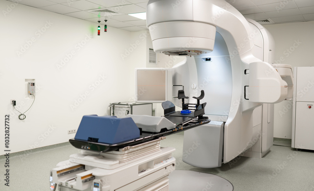 Empty radiotherapy treatment room with linear accelerator ready for use ...