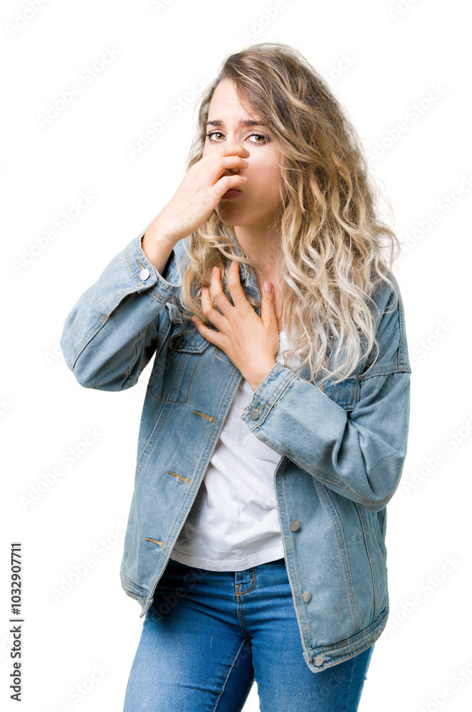 Beautiful young blonde woman wearing denim jacket over isolated ...
