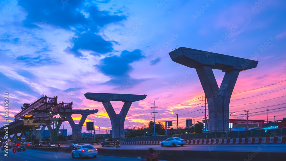 Silhouette of large concrete columns structure of elevated expressway ...
