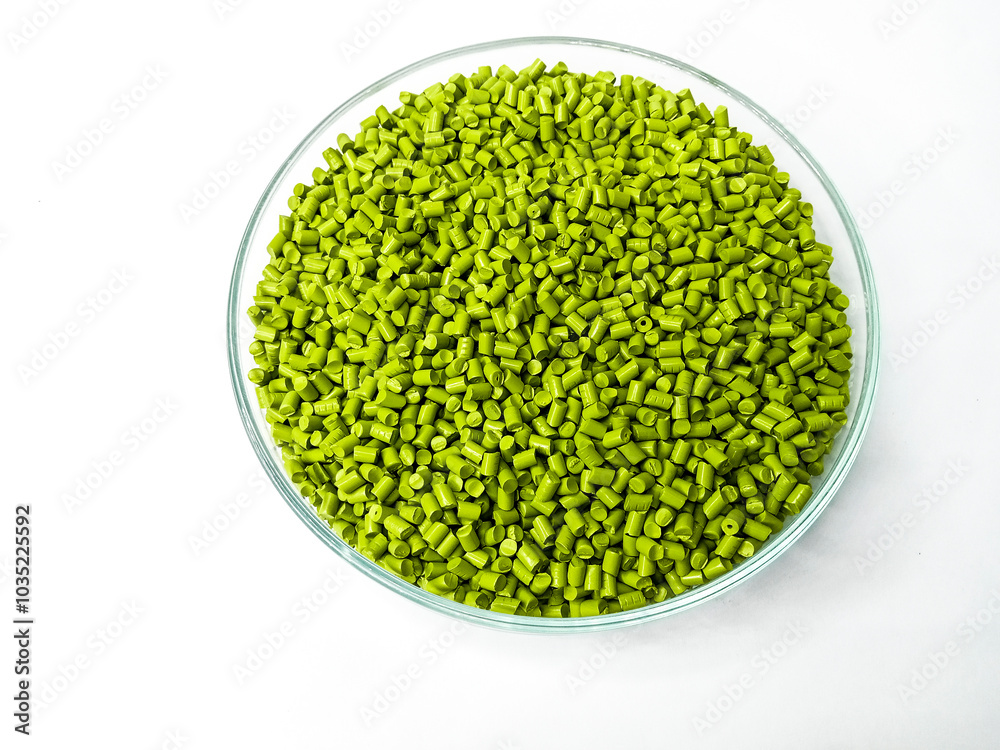 Green masterbatch granules, pigment cold cut pellet shape, in a ...