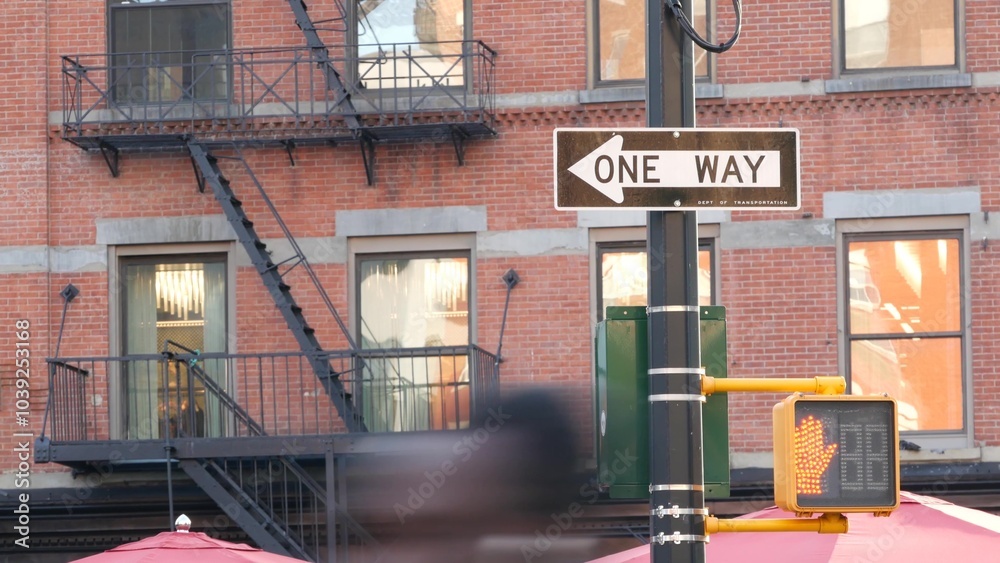 New York City street crossroad, yellow traffic light, oneway transport ...