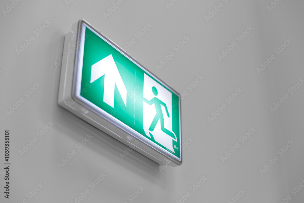 Fotografie exit sign, green sign, emergency exit, safety sign, public ...