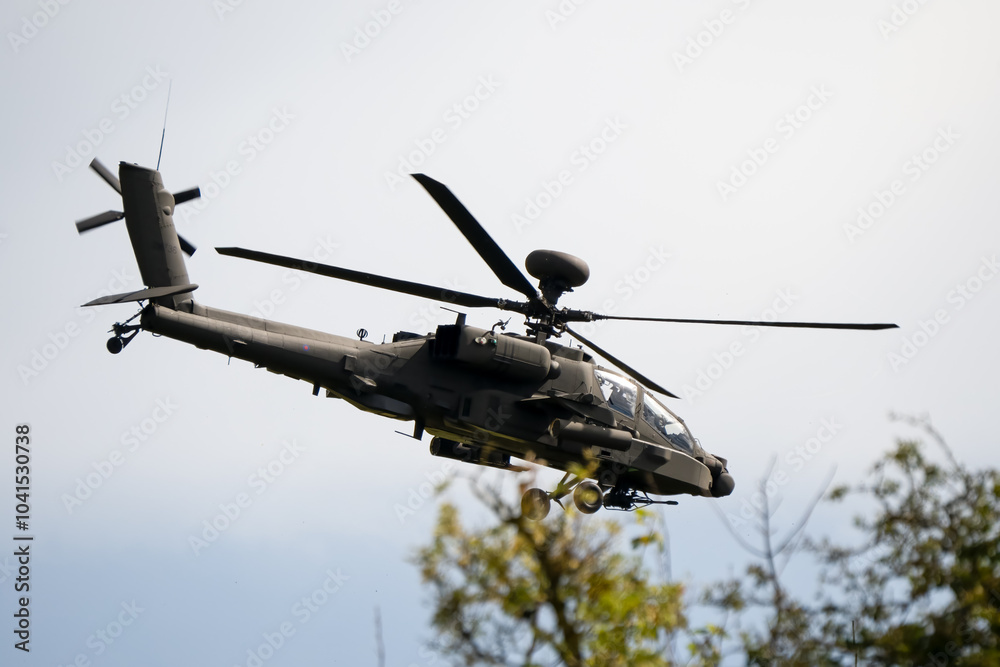 close-up side view of a British army Boeing Apache Attack helicopter ...