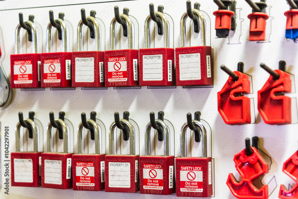 A close-up of a 'lockout station' displaying safety equipment used to ...