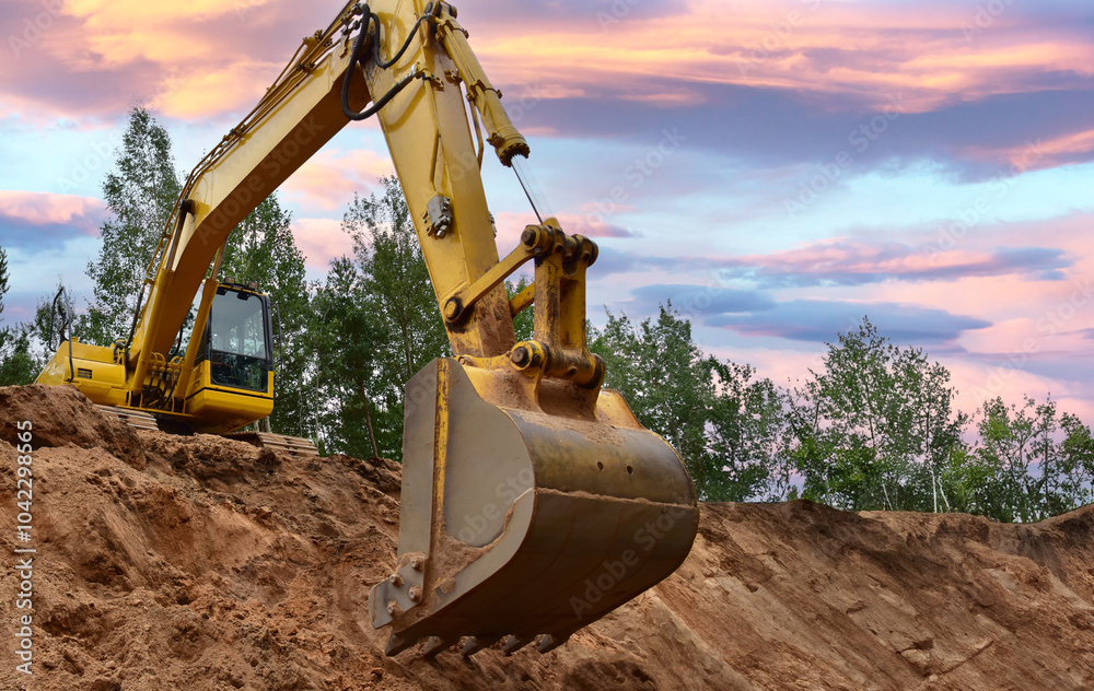 Excavator dig trench at forest on sunset. Backhoe on earthwork. Laying ...