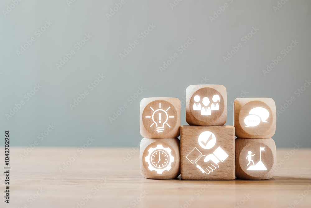Wooden blocks with icons symbolizing essential soft skills for ...