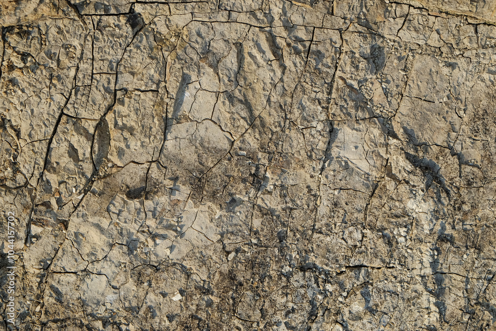 Abstract patterns, shapes and textures of natural cracks on the ...