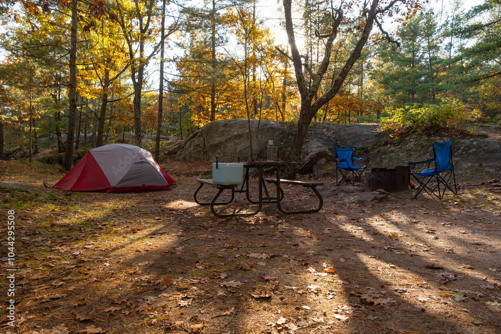 Set up campsite with a tent, camping chars, picnic table, and firepit ...