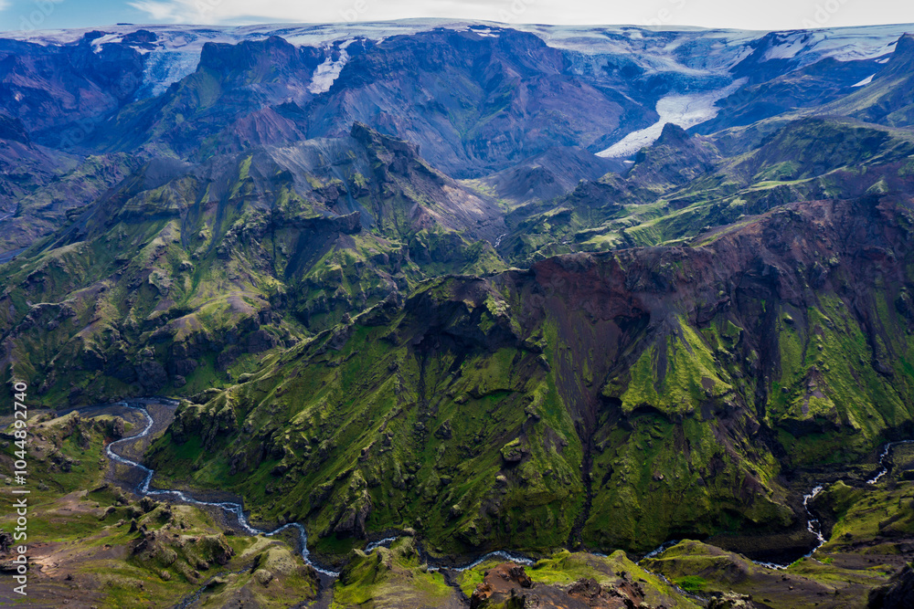Epic view to icelandic landscape with the deep valley with river, hills ...