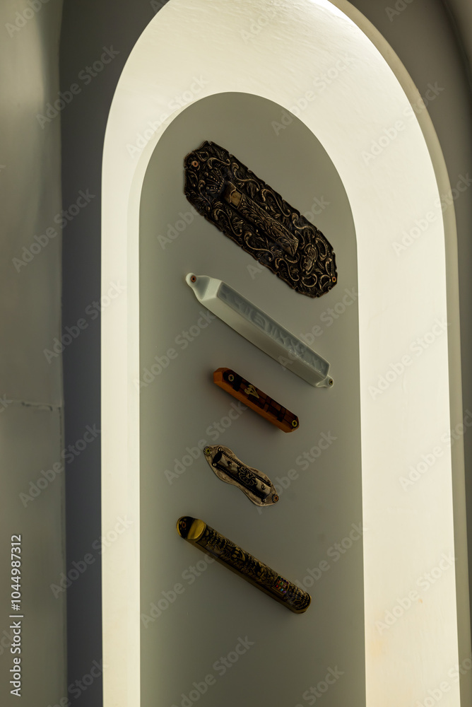 collection of mezuzahs, traditional jewish attributes hung at the ...