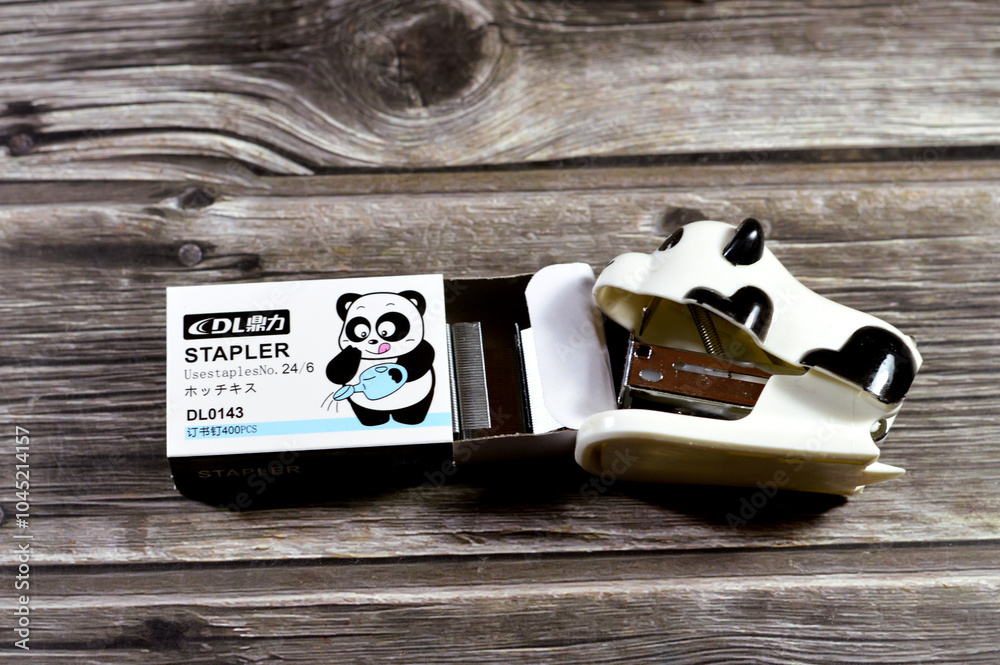 Cairo, Egypt, October 2 2024: Kids stapler with staples, a stapler is a ...