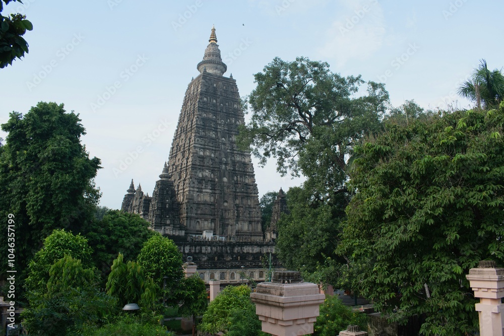central temple tower topped high among the beautiful green surrounding ...