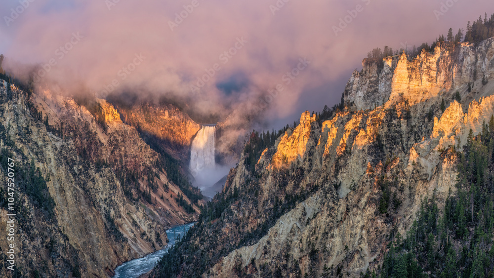 Yellowstone National Park sunrise fog at Artist Point overlook with a ...