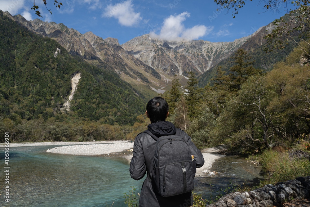 Young male tourist traveling to Kamikochi, Nagano in Japan. Solo ...