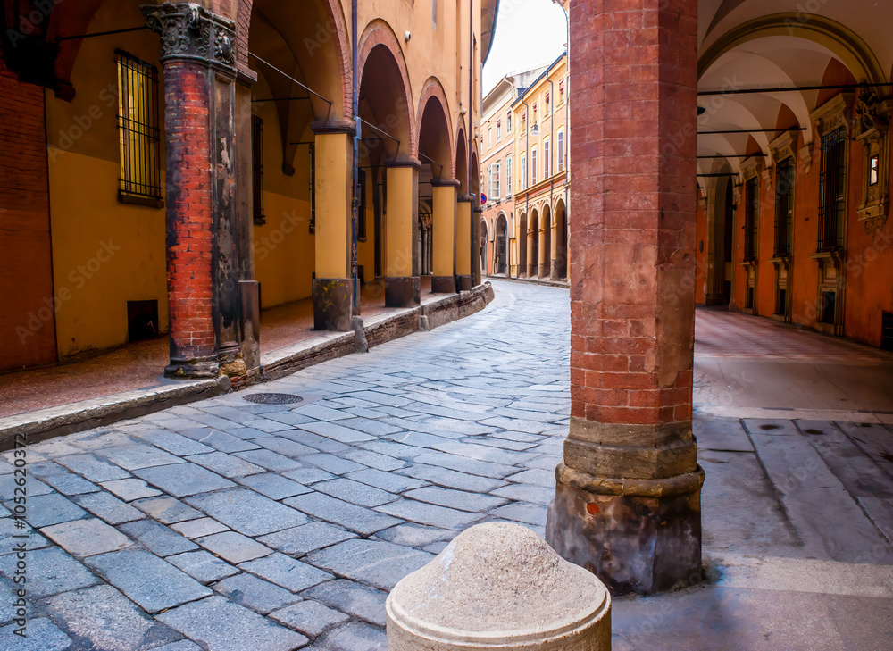 Via Castiglione curved street with porticos, the covered arcades ...