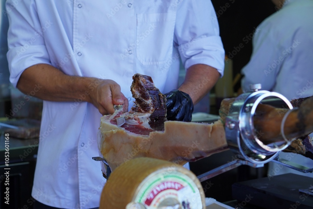 professional ham knife cutter during a gastronomic event in spain Stock ...