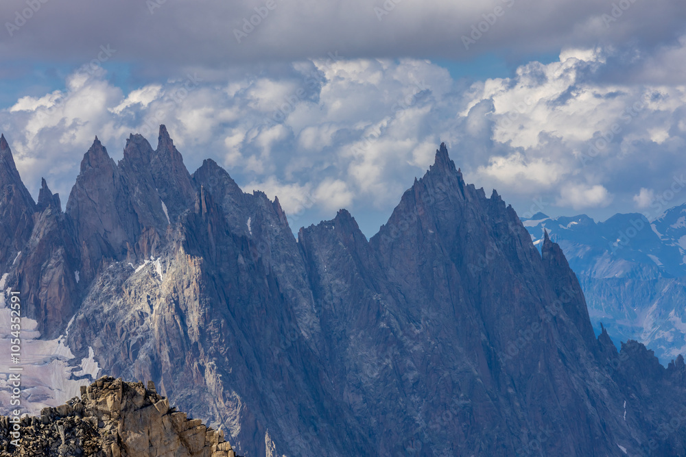 Snow covered mountains and rocky peaks of the Alps from the sky way ...
