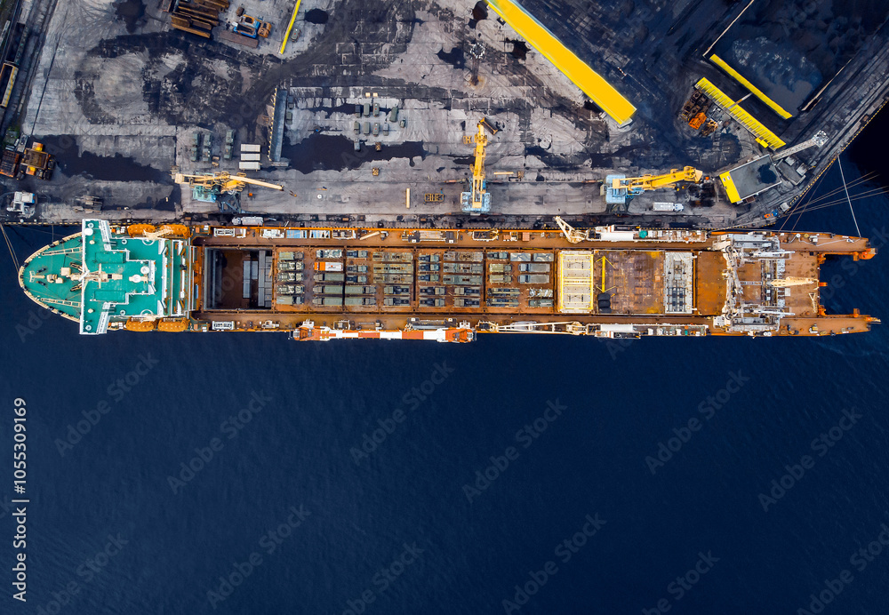 Aerial top view cargo ship with military equipment for transportation ...