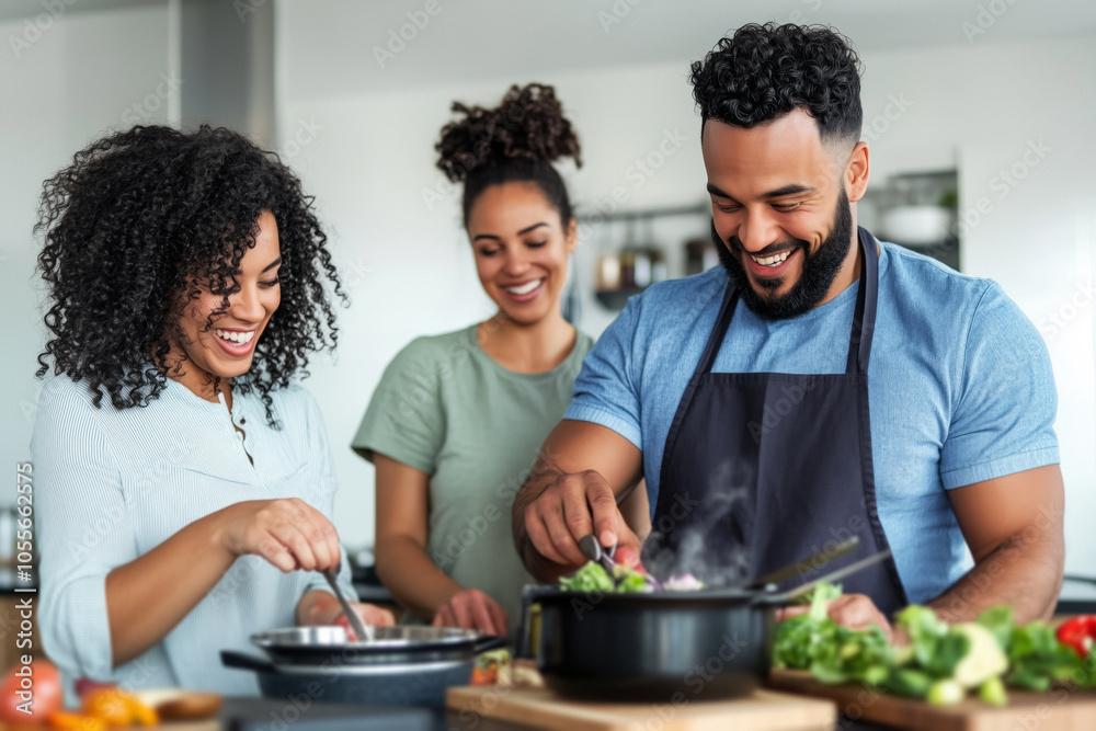 A cheerful group of friends from diverse backgrounds enjoy cooking ...
