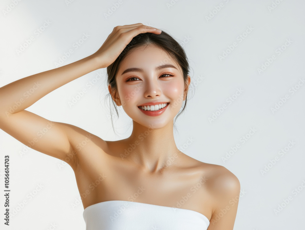 radiant Asian model smiles confidently while showcasing her flawless ...