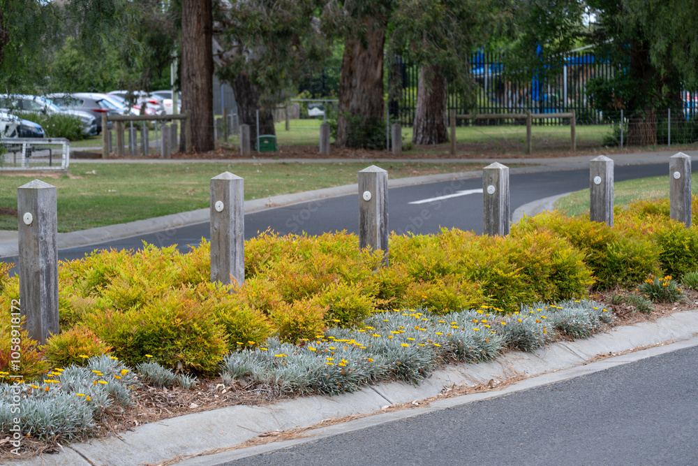 Urban Road Divider with Native Landscaping and Security Bollards. A ...