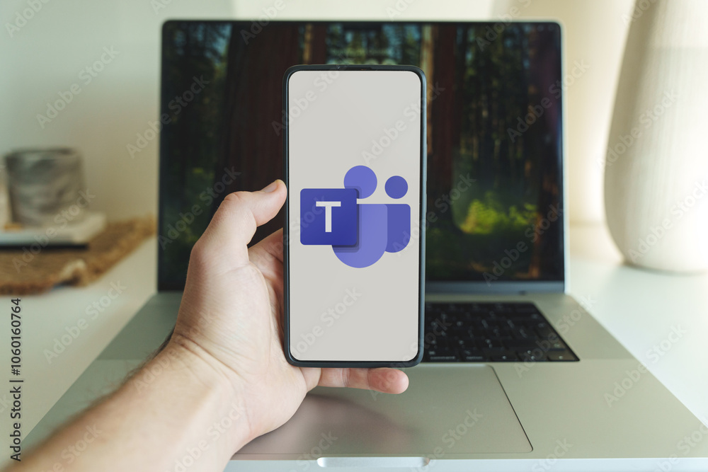 Microsoft teams application logo in front of laptop Stock Photo | Adobe ...