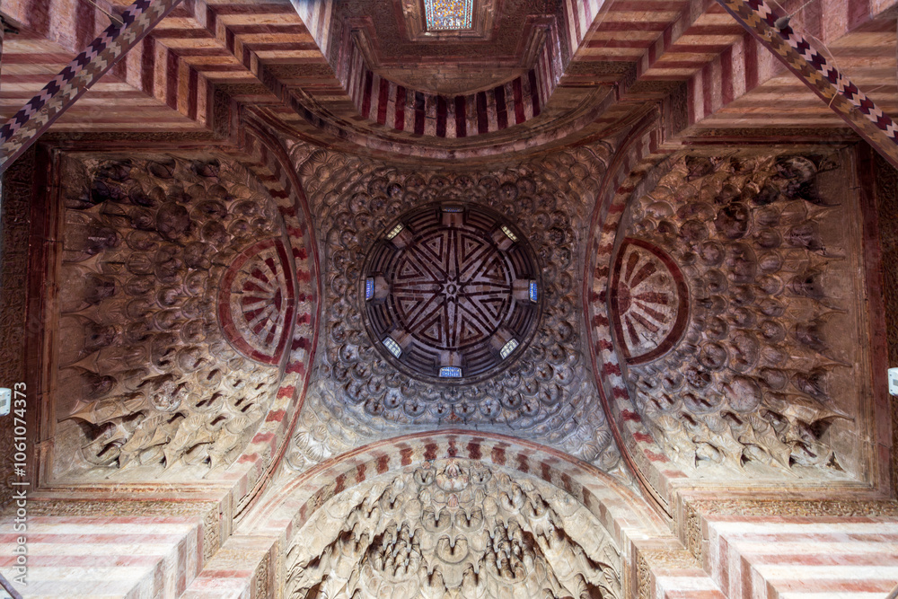 The vestibule chamber's dome with muqarnas and ablaq stonework of the ...
