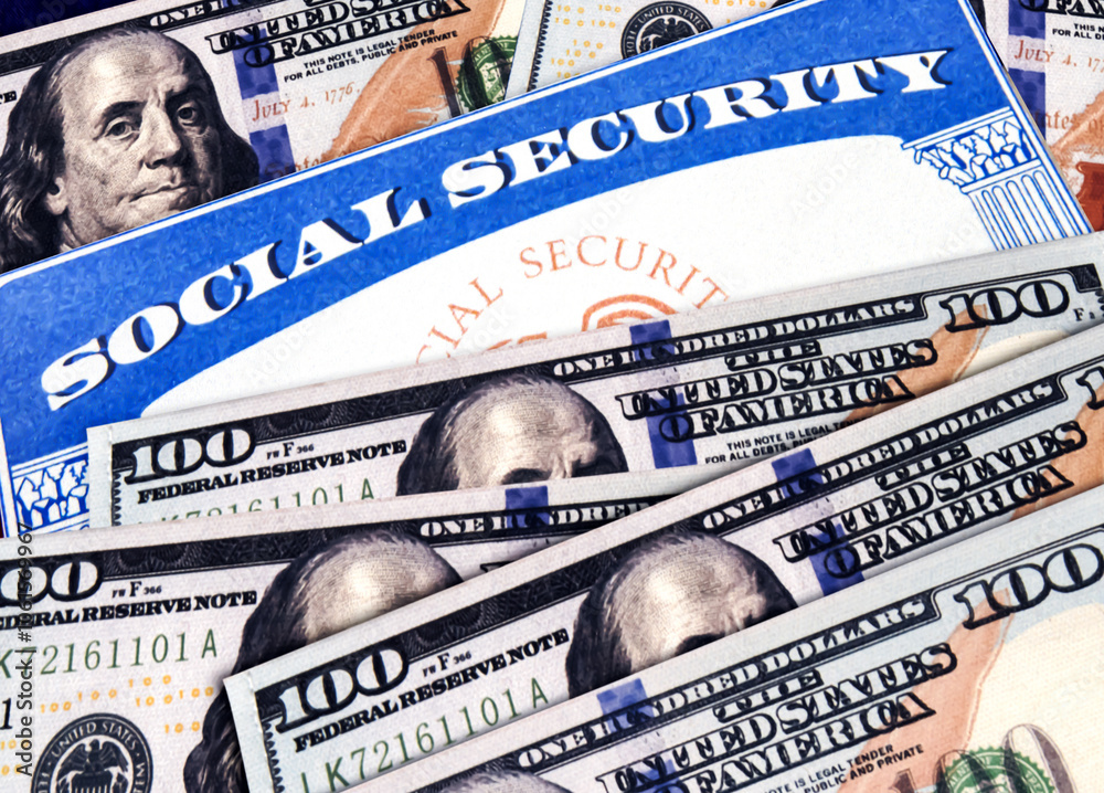 Social Security card is placed on the American flag, background. Social ...