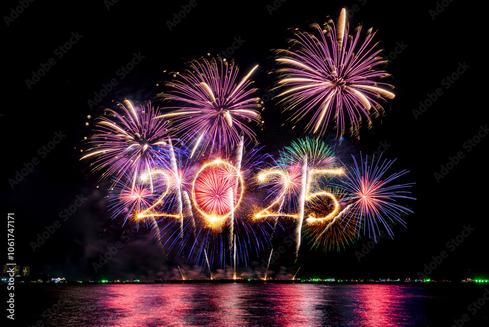 Sparkler 2025 text colorful firework illumination on dark blue sky ...