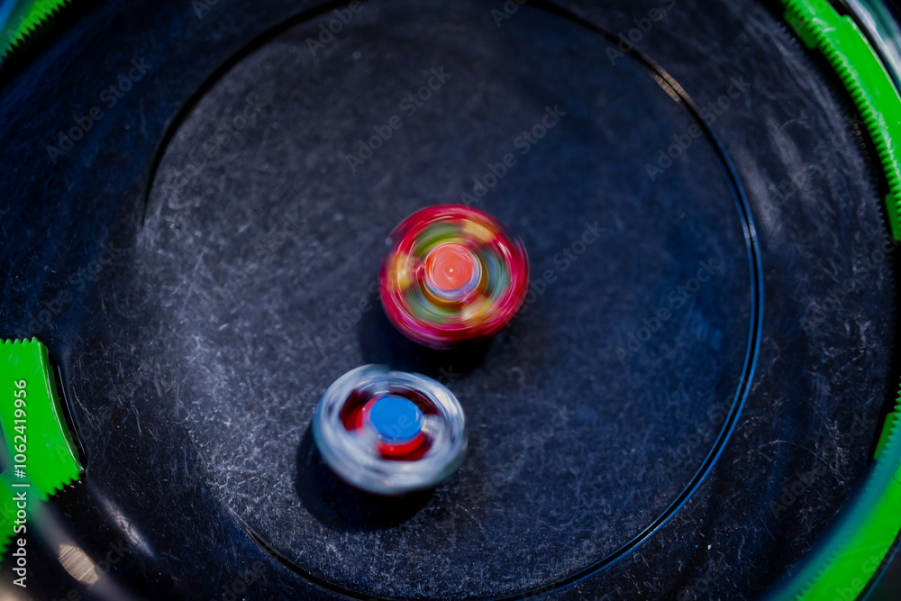 Beyblade battle of spinning toys in a fight of a Japanese origin game ...