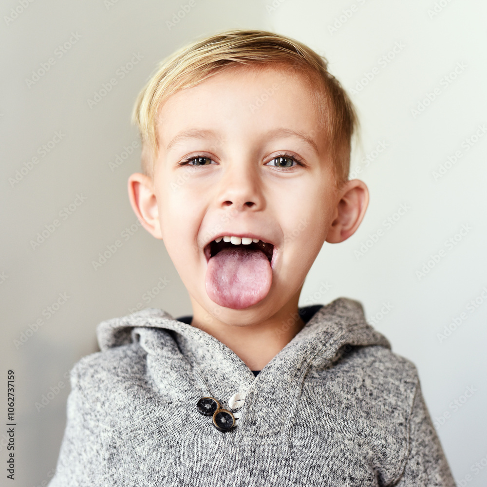Child, portrait and home with tongue out for oral health, sick and ...