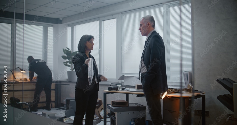 Robbery or murder in office: Female forensic scientist packs gun in zip ...