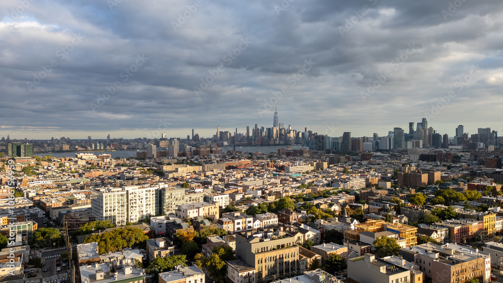 Wide aerial view capturing the neighborhoods of Hoboken and Jersey City ...