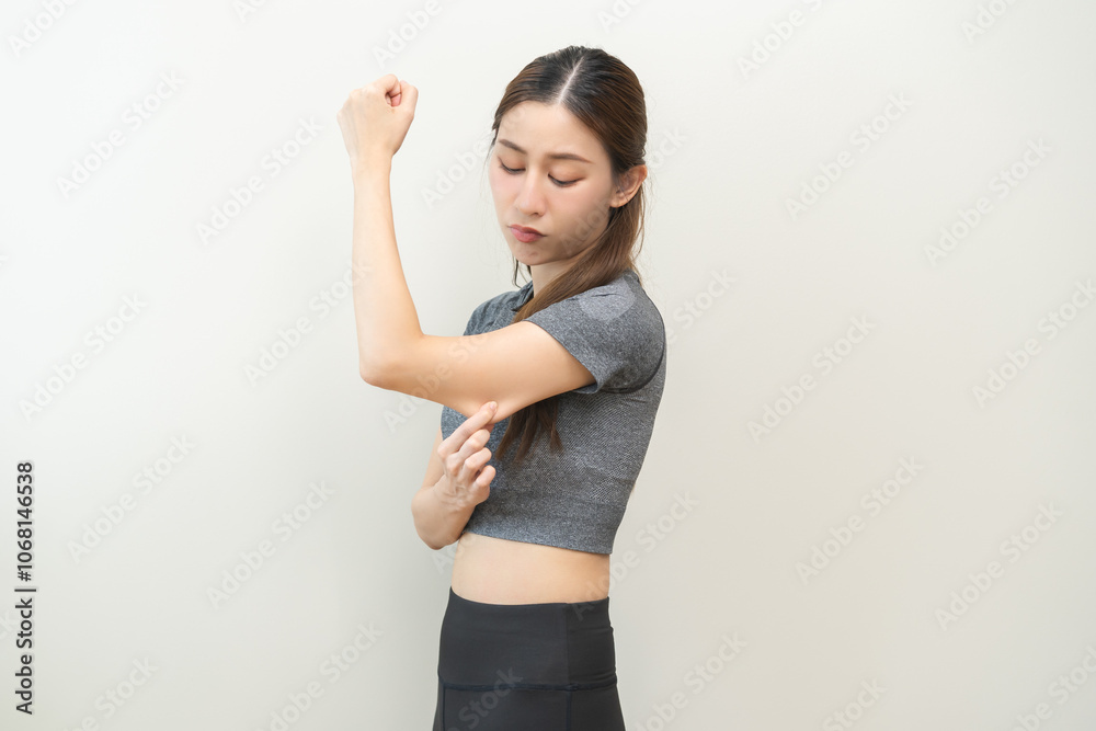Upper arm excess fat concept, asian young woman, girl pinching ...