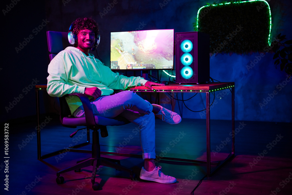 Full size photo of gamer nice young male sit armchair play computer ...