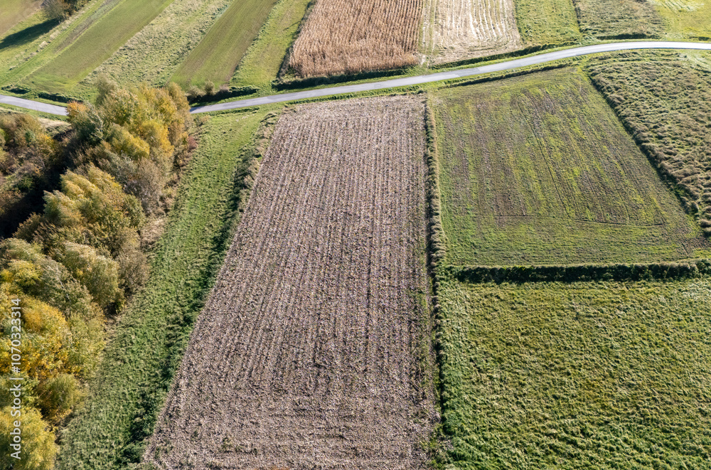 Aerial view of farm fields showcasing various textures and colors of ...