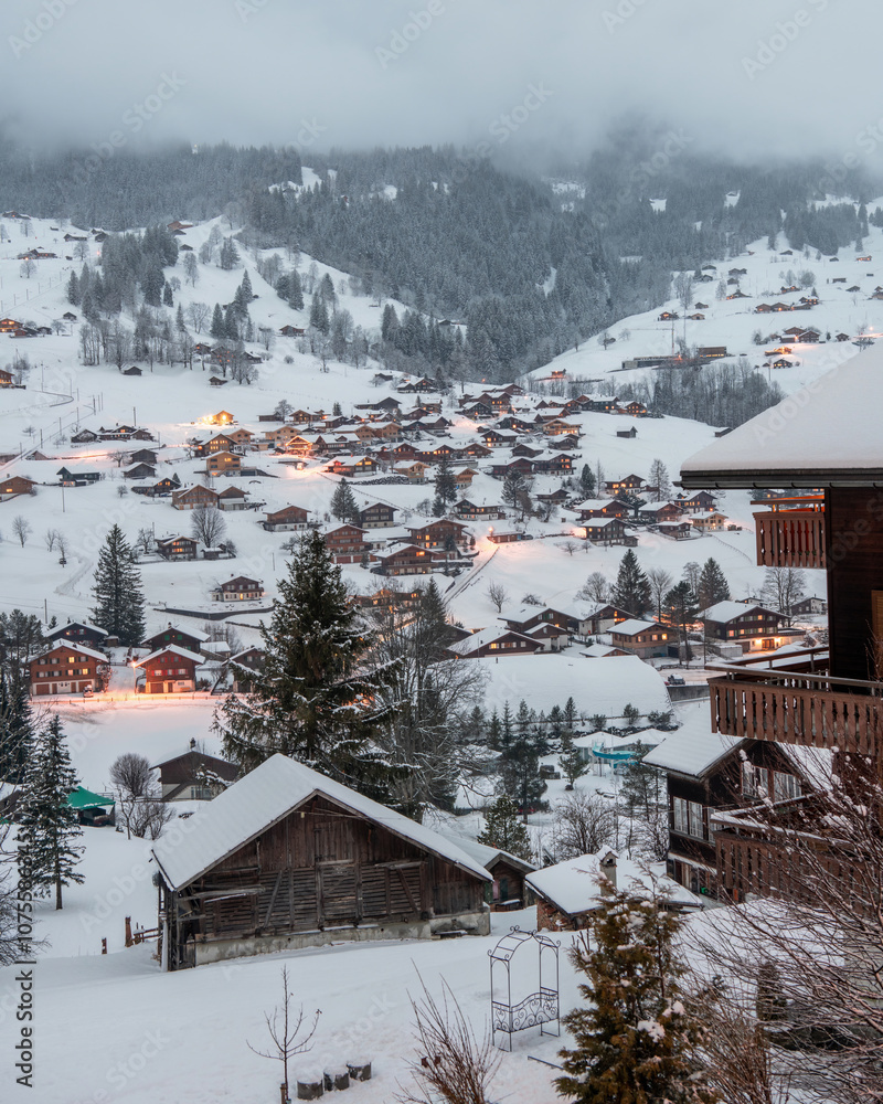 Grindelwald, under the soft glow of the night lights, transforms into a ...