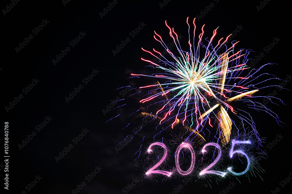 Sparkler 2025. Firework illumination on dark sky background, happy new ...